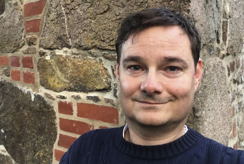 Brian blev headhuntet af Mogens Dam og svinger nu taktstokken